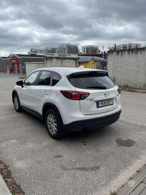 White Mazda CX-5 2013 in Vilnius, with an engine capacity of 2.19 L and mileage of 288 thousand km for 6000 €, photo 5 on AUTOMOTO.COM.LV