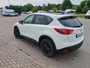 White Mazda CX-5 2013 in Klaipeda, with an engine capacity of 2.00 L and mileage of 210 thousand km for 9500 €, photo 3 on AUTOMOTO.COM.LV