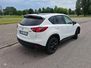 White Mazda CX-5 2013 in Klaipeda, with an engine capacity of 2.00 L and mileage of 210 thousand km for 9500 €, photo 4 on AUTOMOTO.COM.LV
