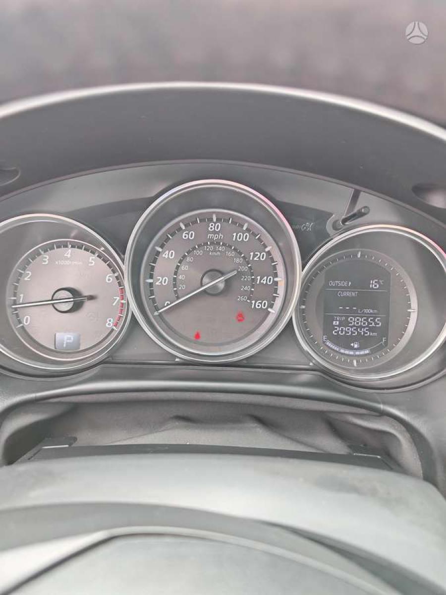 White Mazda CX-5 2013 in Klaipeda, with an engine capacity of 2.00 L and mileage of 210 thousand km for 9500 €, photo 14 on AUTOMOTO.COM.LV