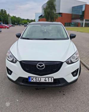 White Mazda CX-5 2013 in Klaipeda, with an engine capacity of 2.00 L and mileage of 210 thousand km for 9500 €, photo 18 on AUTOMOTO.COM.LV