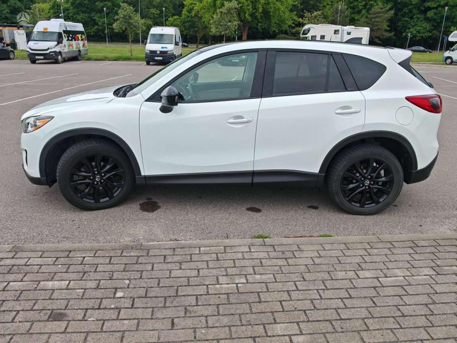 White Mazda CX-5 2013 in Klaipeda, with an engine capacity of 2.00 L and mileage of 210 thousand km for 9500 €, photo 19 on AUTOMOTO.COM.LV