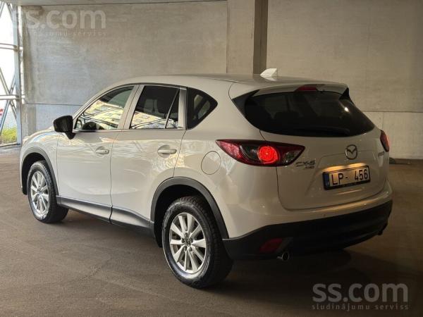 Mazda CX-5 2013 in Riga on AUTOMOTO.COM.LV White Mazda CX-5 2013 in Riga, with an engine capacity of 2.20 L and mileage of 339 thousand km for 6250 ā¬, photo 5 on AUTOMOTO.COM.LV