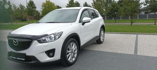 White Mazda CX-5 2013 in Siauliai, with an engine capacity of 2.20 L and mileage of 229 thousand km for 7750 €, photo 4 on AUTOMOTO.COM.LV