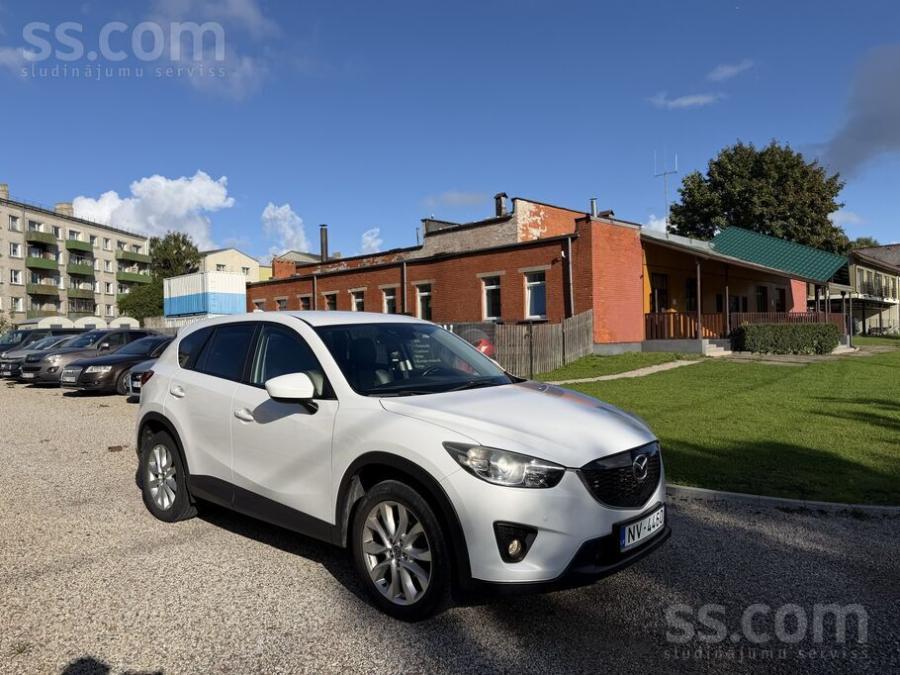 White Mazda CX-5 2013 in Ventspils, with an engine capacity of 2.20 L and mileage of 243 thousand km for 6500 €, photo 4 on AUTOMOTO.COM.LV