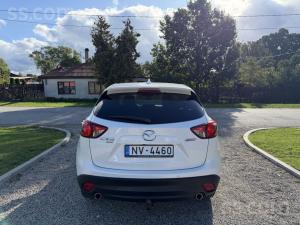 White Mazda CX-5 2013 in Ventspils, with an engine capacity of 2.20 L and mileage of 243 thousand km for 6500 €, photo 7 on AUTOMOTO.COM.LV