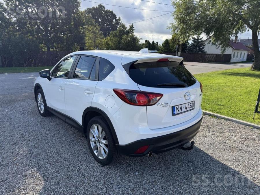 White Mazda CX-5 2013 in Ventspils, with an engine capacity of 2.20 L and mileage of 243 thousand km for 6500 €, photo 8 on AUTOMOTO.COM.LV