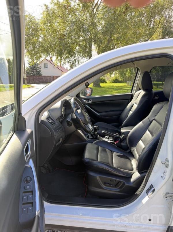 White Mazda CX-5 2013 in Ventspils, with an engine capacity of 2.20 L and mileage of 243 thousand km for 6500 €, photo 10 on AUTOMOTO.COM.LV