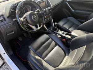 White Mazda CX-5 2013 in Ventspils, with an engine capacity of 2.20 L and mileage of 243 thousand km for 6500 €, photo 12 on AUTOMOTO.COM.LV