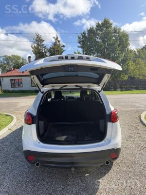 White Mazda CX-5 2013 in Ventspils, with an engine capacity of 2.20 L and mileage of 243 thousand km for 6500 €, photo 16 on AUTOMOTO.COM.LV