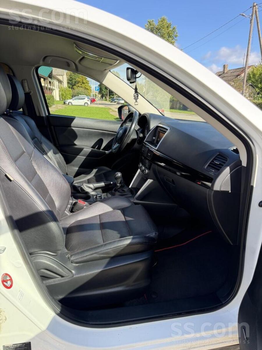 White Mazda CX-5 2013 in Ventspils, with an engine capacity of 2.20 L and mileage of 243 thousand km for 6500 €, photo 17 on AUTOMOTO.COM.LV