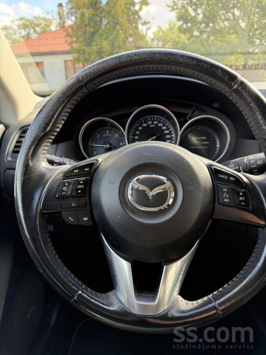 White Mazda CX-5 2013 in Ventspils, with an engine capacity of 2.20 L and mileage of 243 thousand km for 6500 €, photo 23 on AUTOMOTO.COM.LV