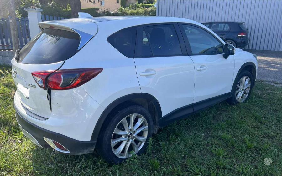 White Mazda CX-5 2013 in Taurage, with an engine capacity of 2.19 L and mileage of 166 thousand km for 4300 €, photo 5 on AUTOMOTO.COM.LV
