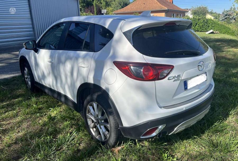 White Mazda CX-5 2013 in Taurage, with an engine capacity of 2.19 L and mileage of 166 thousand km for 4300 €, photo 6 on AUTOMOTO.COM.LV