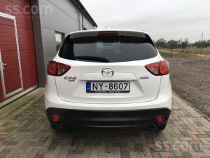 White Mazda CX-5 2014 in Talsi, with an engine capacity of 2.20 L and mileage of 135 thousand km for 8999 €, photo 4 on AUTOMOTO.COM.LV