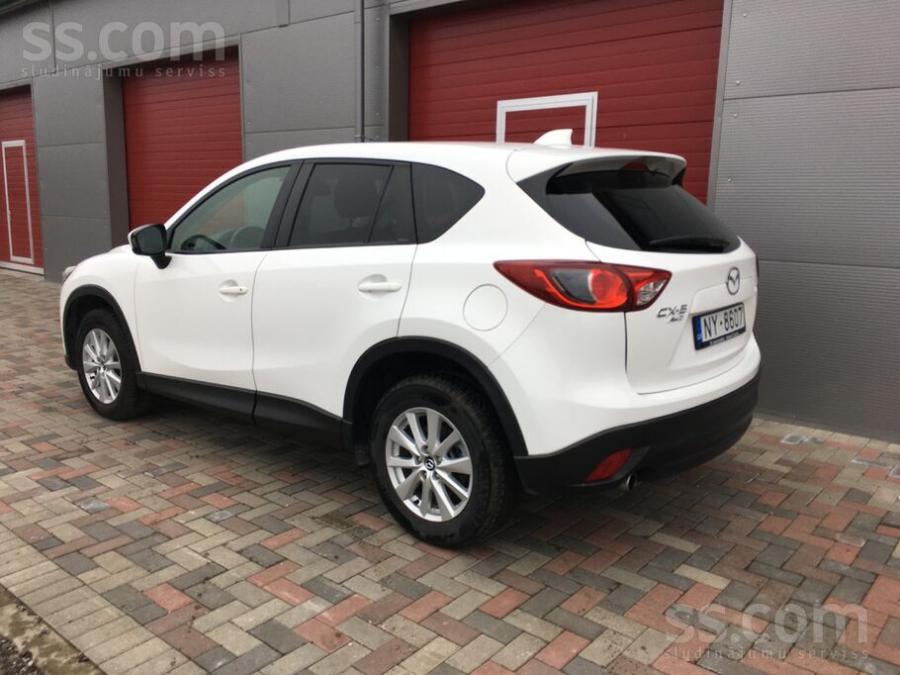 White Mazda CX-5 2014 in Talsi, with an engine capacity of 2.20 L and mileage of 135 thousand km for 8999 €, photo 5 on AUTOMOTO.COM.LV