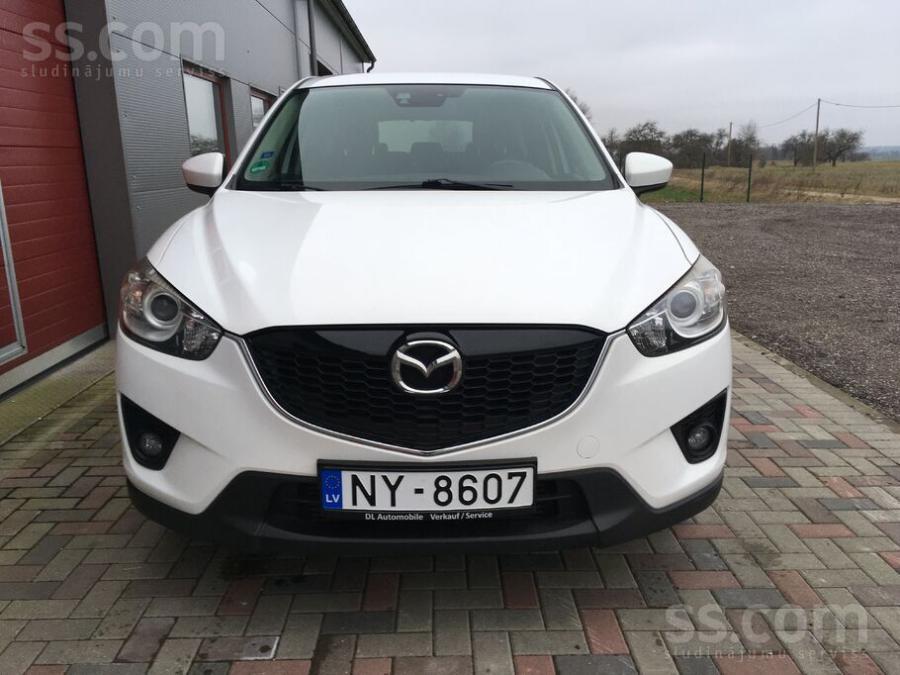 White Mazda CX-5 2014 in Talsi, with an engine capacity of 2.20 L and mileage of 135 thousand km for 8999 €, photo 8 on AUTOMOTO.COM.LV
