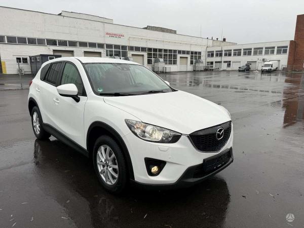 White Mazda CX-5 2014 in Marijampole, with an engine capacity of 2.19 L and mileage of 202 thousand km for 7750 €, photo 4 on AUTOMOTO.COM.LV
