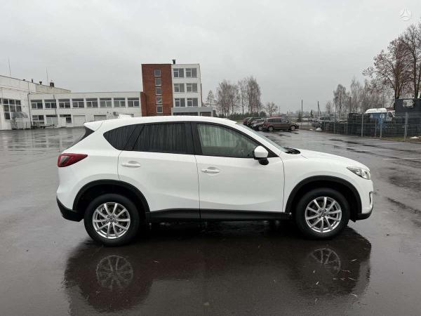 White Mazda CX-5 2014 in Marijampole, with an engine capacity of 2.19 L and mileage of 202 thousand km for 7750 €, photo 5 on AUTOMOTO.COM.LV