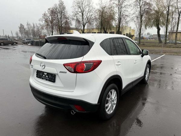 White Mazda CX-5 2014 in Marijampole, with an engine capacity of 2.19 L and mileage of 202 thousand km for 7750 €, photo 6 on AUTOMOTO.COM.LV