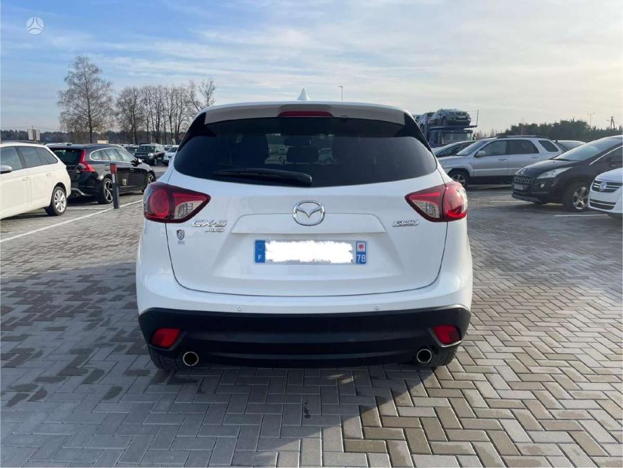 White Mazda CX-5 2014 in Taurage, with an engine capacity of 2.19 L and mileage of 170 thousand km for 6600 €, photo 6 on AUTOMOTO.COM.LV