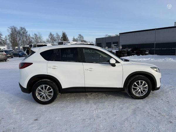 White Mazda CX-5 2014 in Marijampole, with an engine capacity of 2.19 L and mileage of 202 thousand km for 7700 €, photo 5 on AUTOMOTO.COM.LV