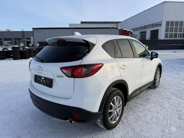 White Mazda CX-5 2014 in Marijampole, with an engine capacity of 2.19 L and mileage of 202 thousand km for 7700 €, photo 6 on AUTOMOTO.COM.LV
