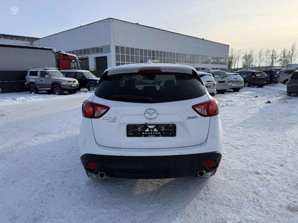White Mazda CX-5 2014 in Marijampole, with an engine capacity of 2.19 L and mileage of 202 thousand km for 7700 €, photo 8 on AUTOMOTO.COM.LV
