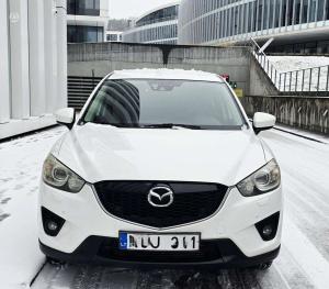 White Mazda CX-5 2014 in Vilnius, with an engine capacity of 2.19 L and mileage of 240 thousand km for 4600 €, photo 2 on AUTOMOTO.COM.LV