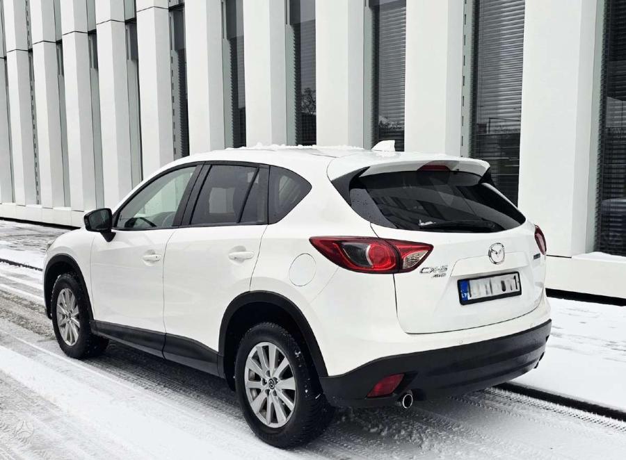 White Mazda CX-5 2014 in Vilnius, with an engine capacity of 2.19 L and mileage of 240 thousand km for 4600 €, photo 5 on AUTOMOTO.COM.LV