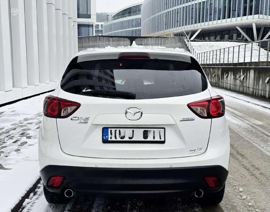 White Mazda CX-5 2014 in Vilnius, with an engine capacity of 2.19 L and mileage of 240 thousand km for 4600 €, photo 6 on AUTOMOTO.COM.LV