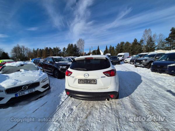 White Mazda CX-5 2014 in Tartu, with an engine capacity of 2.20 L and mileage of 165 thousand km for 9790 €, photo 9 on AUTOMOTO.COM.LV