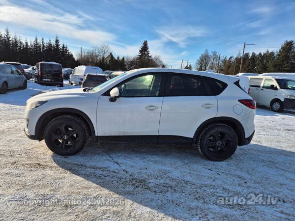 White Mazda CX-5 2014 in Tartu, with an engine capacity of 2.20 L and mileage of 165 thousand km for 9790 €, photo 10 on AUTOMOTO.COM.LV