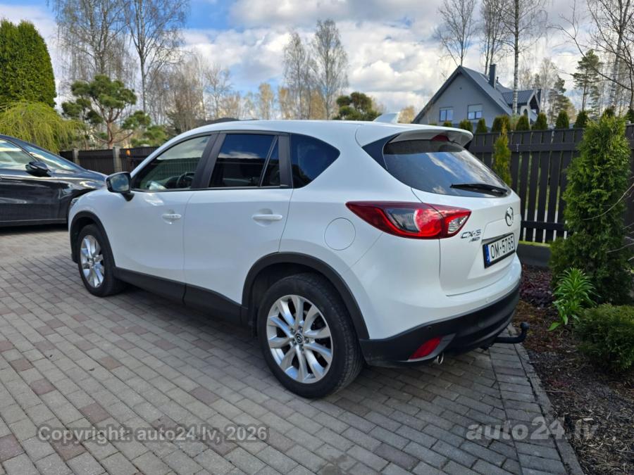 White Mazda CX-5 2014 in Riga, with an engine capacity of 2.20 L and mileage of 205 thousand km for 8750 €, photo 5 on AUTOMOTO.COM.LV