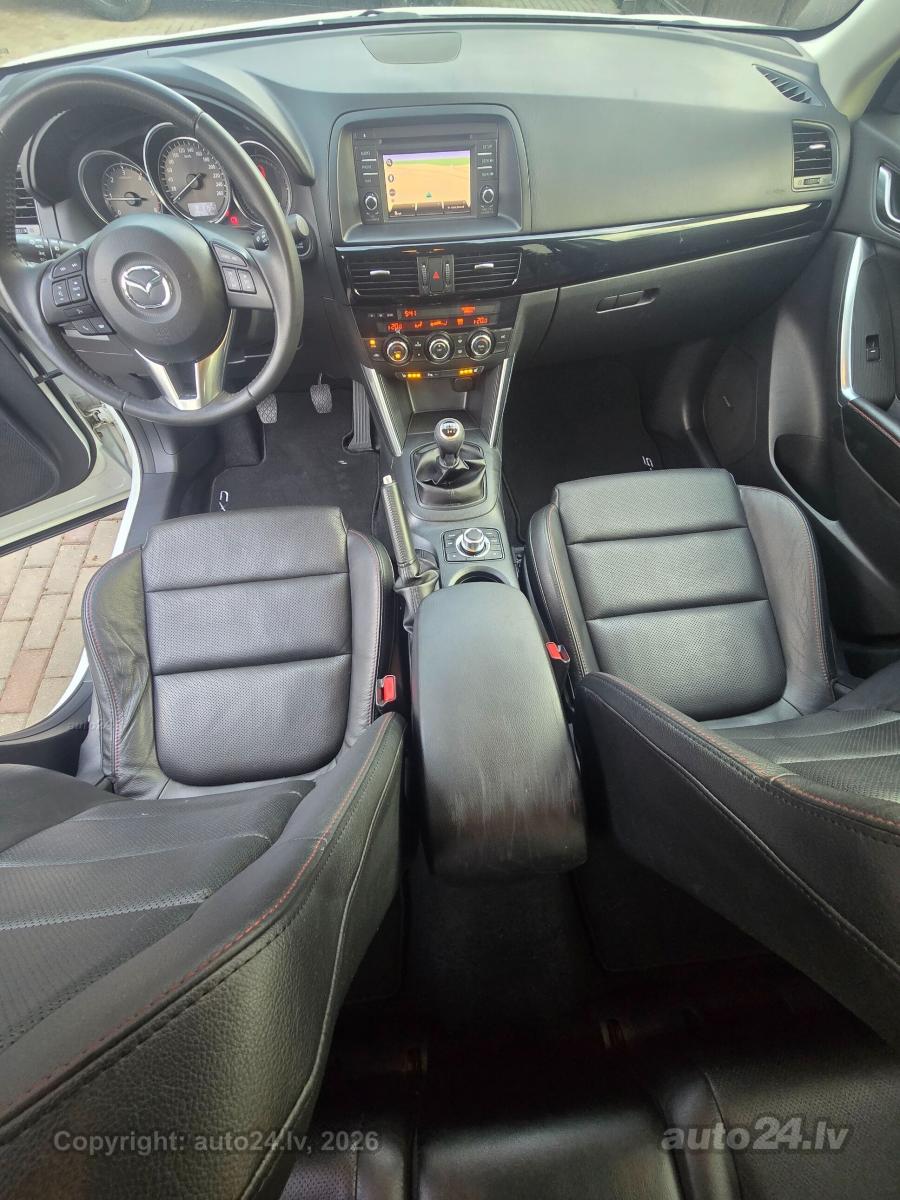 White Mazda CX-5 2014 in Riga, with an engine capacity of 2.20 L and mileage of 205 thousand km for 8750 €, photo 17 on AUTOMOTO.COM.LV