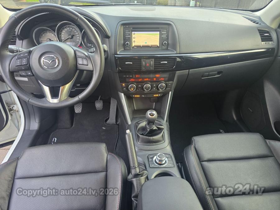 White Mazda CX-5 2014 in Riga, with an engine capacity of 2.20 L and mileage of 205 thousand km for 8750 €, photo 18 on AUTOMOTO.COM.LV