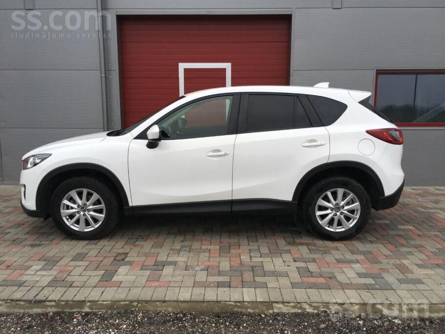 White Mazda CX-5 2014 in Talsi, with an engine capacity of 2.20 L and mileage of 135 thousand km for 8999 €, photo 7 on AUTOMOTO.COM.LV