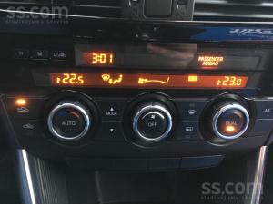White Mazda CX-5 2014 in Talsi, with an engine capacity of 2.20 L and mileage of 135 thousand km for 8999 €, photo 13 on AUTOMOTO.COM.LV