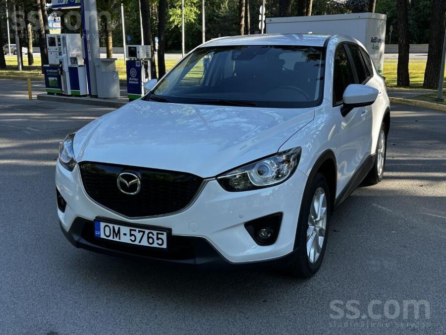 White Mazda CX-5 2014 in Riga, with an engine capacity of 2.20 L and mileage of 205 thousand km for 8799 €, photo 6 on AUTOMOTO.COM.LV