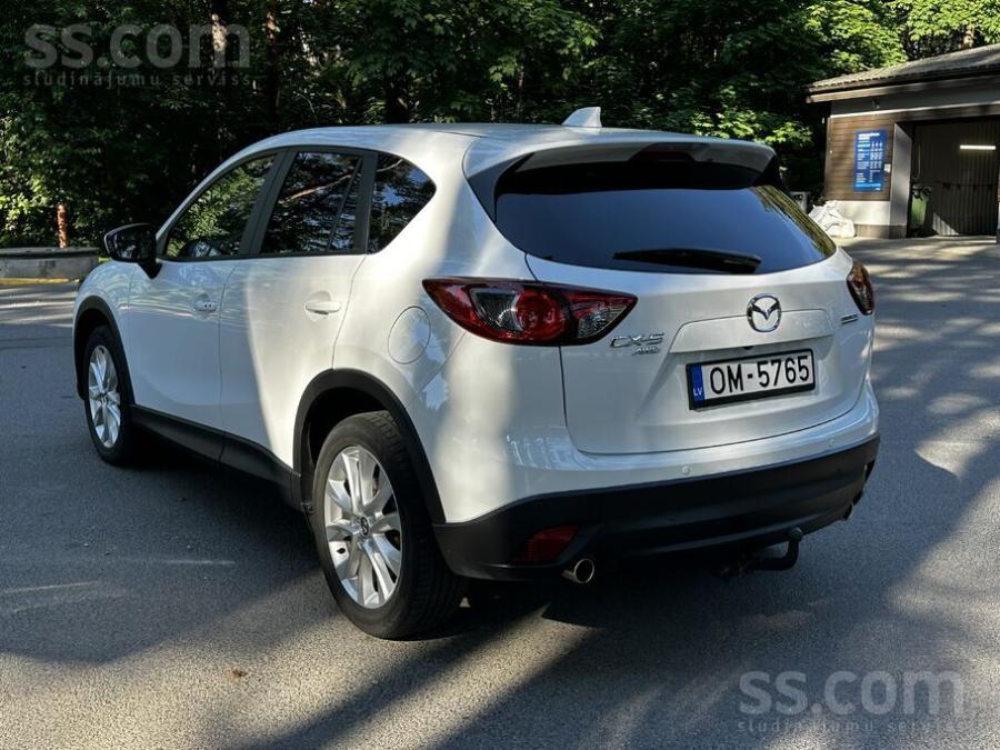 White Mazda CX-5 2014 in Riga, with an engine capacity of 2.20 L and mileage of 205 thousand km for 8799 €, photo 7 on AUTOMOTO.COM.LV