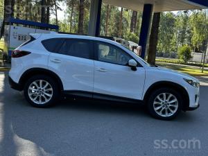 White Mazda CX-5 2014 in Riga, with an engine capacity of 2.20 L and mileage of 205 thousand km for 8799 €, photo 8 on AUTOMOTO.COM.LV