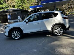 White Mazda CX-5 2014 in Riga, with an engine capacity of 2.20 L and mileage of 205 thousand km for 8799 €, photo 9 on AUTOMOTO.COM.LV