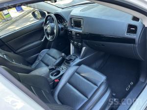 White Mazda CX-5 2014 in Riga, with an engine capacity of 2.20 L and mileage of 205 thousand km for 8799 €, photo 15 on AUTOMOTO.COM.LV