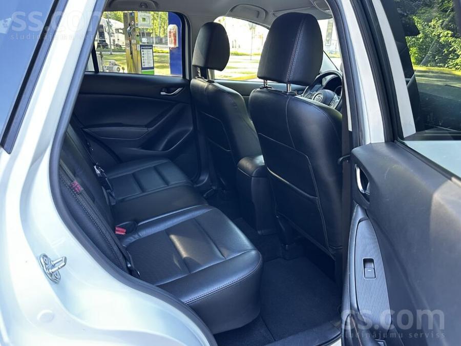 White Mazda CX-5 2014 in Riga, with an engine capacity of 2.20 L and mileage of 205 thousand km for 8799 €, photo 16 on AUTOMOTO.COM.LV