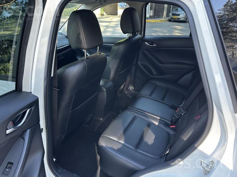 White Mazda CX-5 2014 in Riga, with an engine capacity of 2.20 L and mileage of 205 thousand km for 8799 €, photo 17 on AUTOMOTO.COM.LV