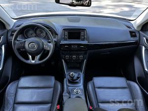 White Mazda CX-5 2014 in Riga, with an engine capacity of 2.20 L and mileage of 205 thousand km for 8799 €, photo 18 on AUTOMOTO.COM.LV