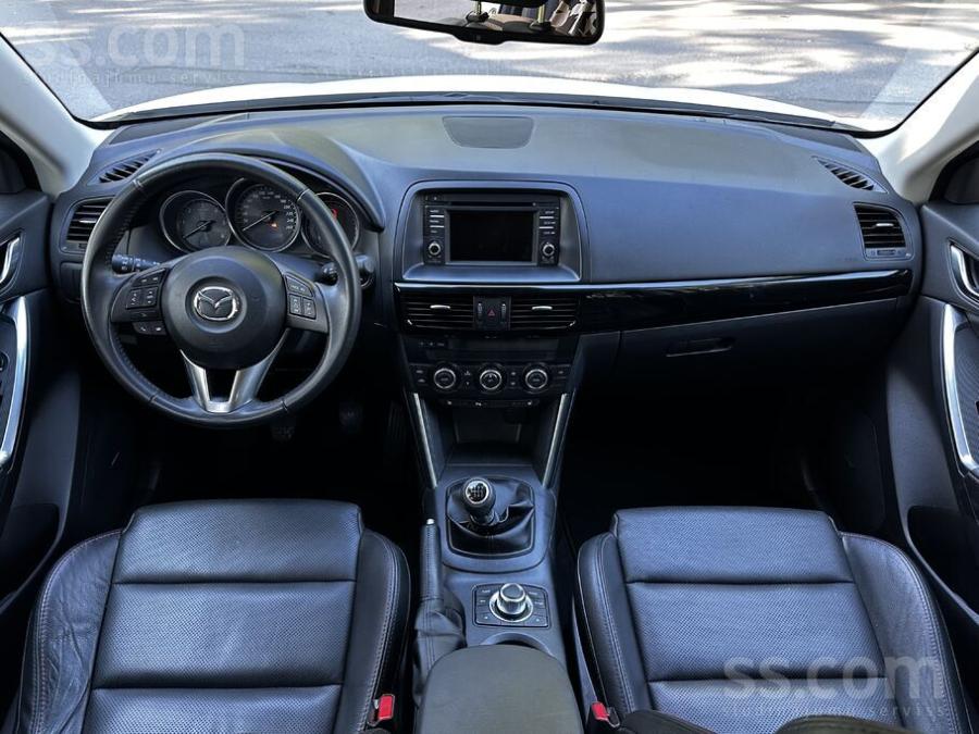 White Mazda CX-5 2014 in Riga, with an engine capacity of 2.20 L and mileage of 205 thousand km for 8799 €, photo 18 on AUTOMOTO.COM.LV