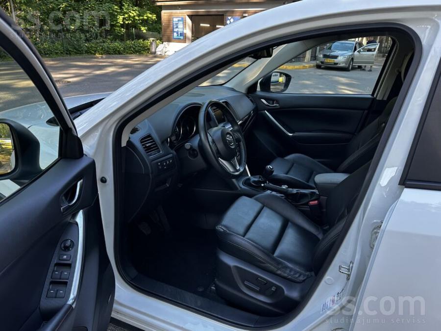 White Mazda CX-5 2014 in Riga, with an engine capacity of 2.20 L and mileage of 205 thousand km for 8799 €, photo 19 on AUTOMOTO.COM.LV