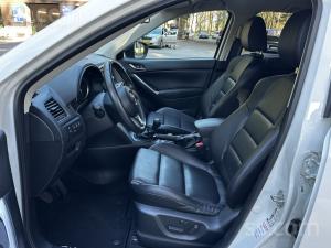 White Mazda CX-5 2014 in Riga, with an engine capacity of 2.20 L and mileage of 205 thousand km for 8799 €, photo 23 on AUTOMOTO.COM.LV