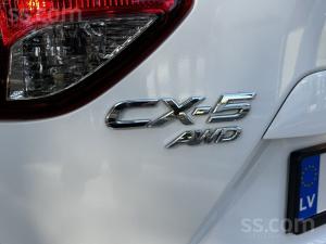 White Mazda CX-5 2014 in Riga, with an engine capacity of 2.20 L and mileage of 205 thousand km for 8799 €, photo 30 on AUTOMOTO.COM.LV